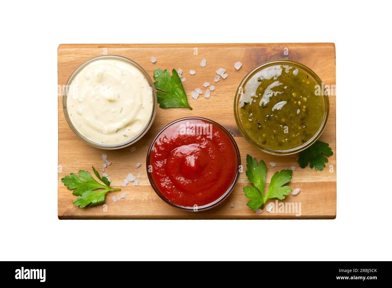 Many different sauces and herbs on table, flat lay top view. sauces on ...