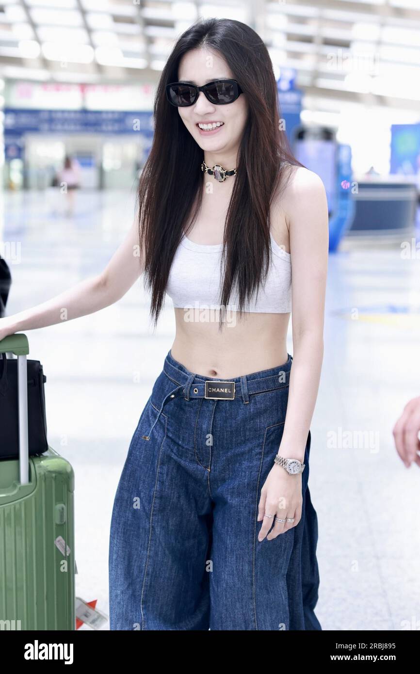 Chinese actress and singer Xu Lu appears at airport in Beijing, China ...