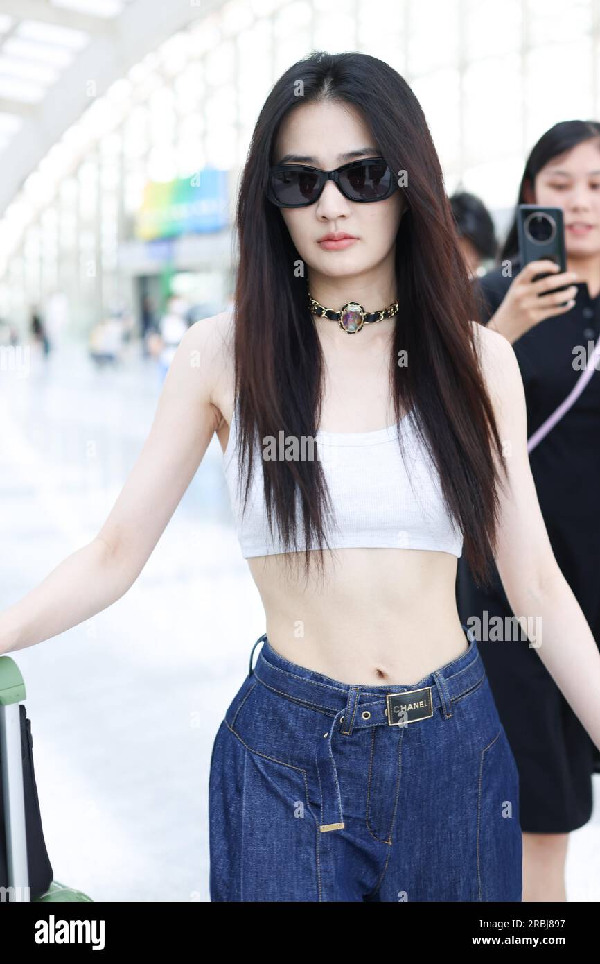 Chinese actress and singer Xu Lu appears at airport in Beijing, China ...