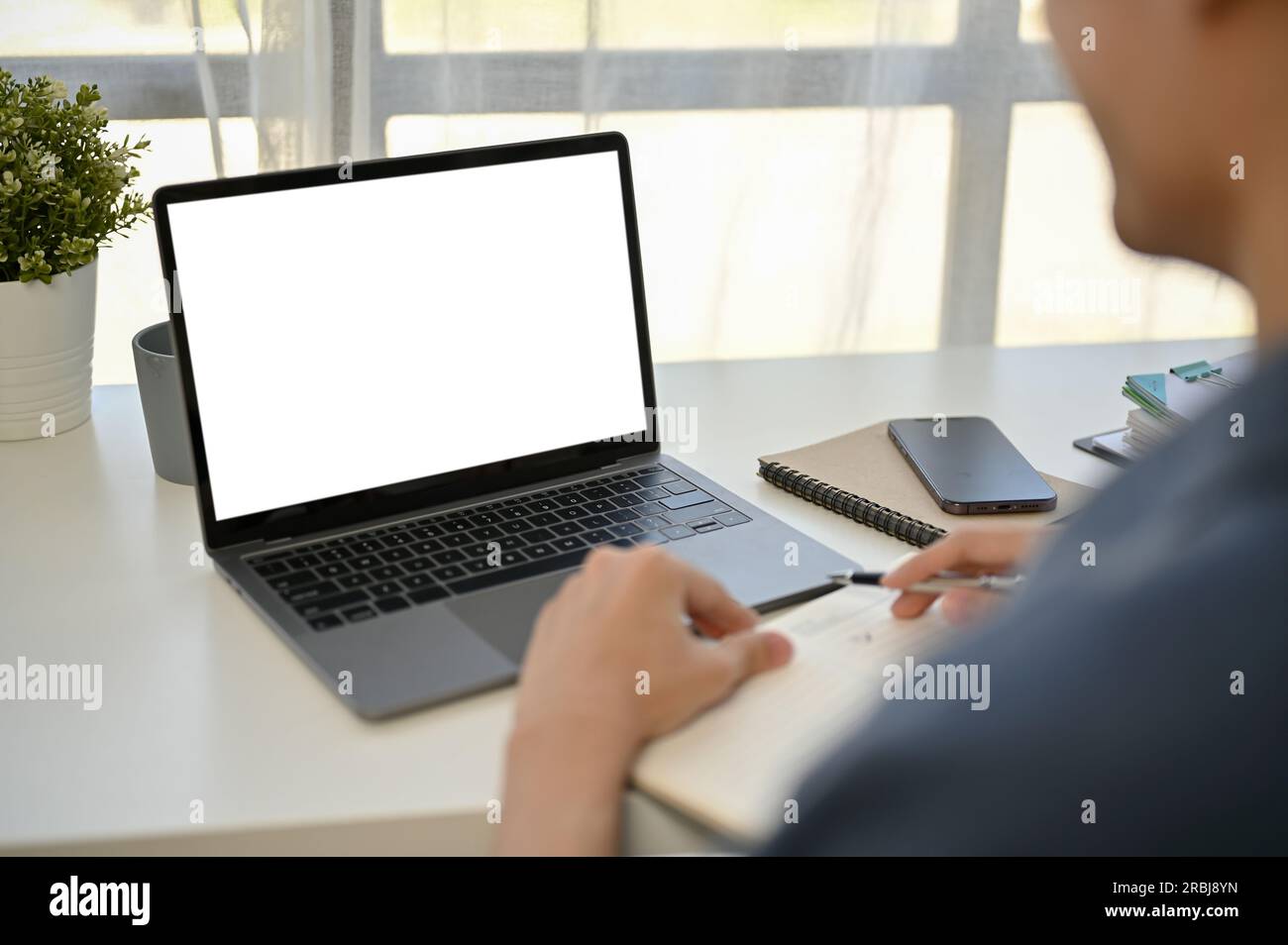 Close-up image of a focused businessman or male worker working on his ...