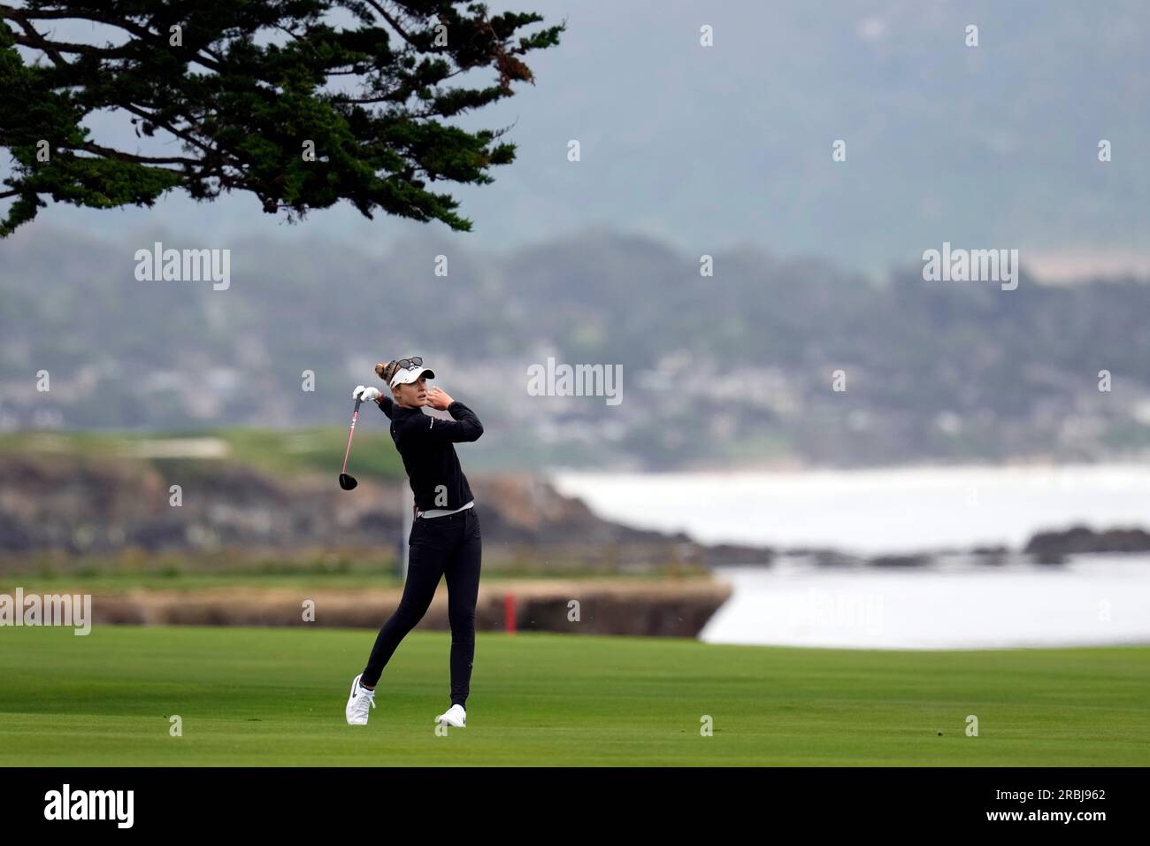 Nelly Korda watches her approach shot from the 18th fairway during the ...