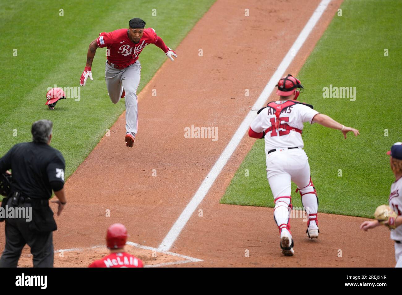 Cincinnati Reds' Will Benson, left, beats a throw to Washington ...