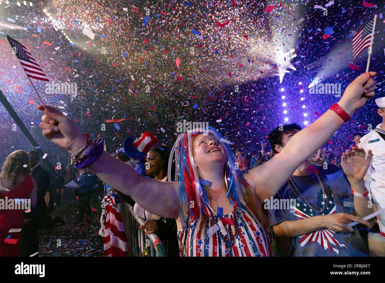 Confetti falls on the audience during the Boston Pops Fireworks ...