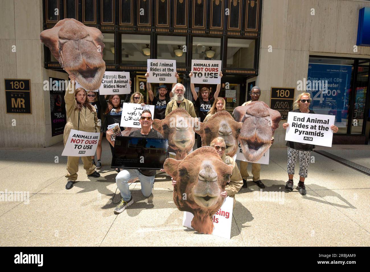 Photo by: PETA/STAR MAX/IPx 2023 PETA supporters wearing giant camel ...