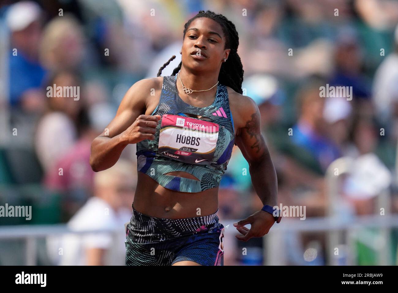 Aleia Hobbs competes in a women's 100 meter preliminary heat during the ...