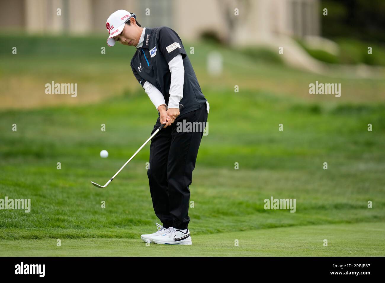 Hyo Joo Kim chips to the 13th green during the first round of the U.S ...