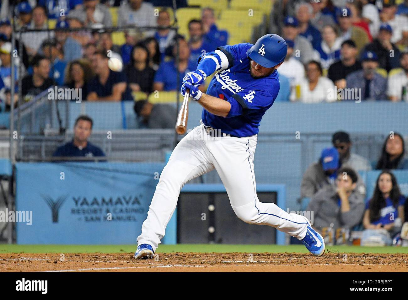 Los Angeles Dodgers' Max Muncy, left, hits a two-run home run during ...