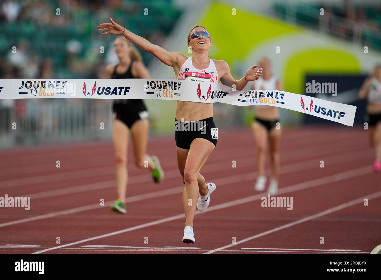 Elise Cranny reacts as she wins the women's 10,000 meter race during ...