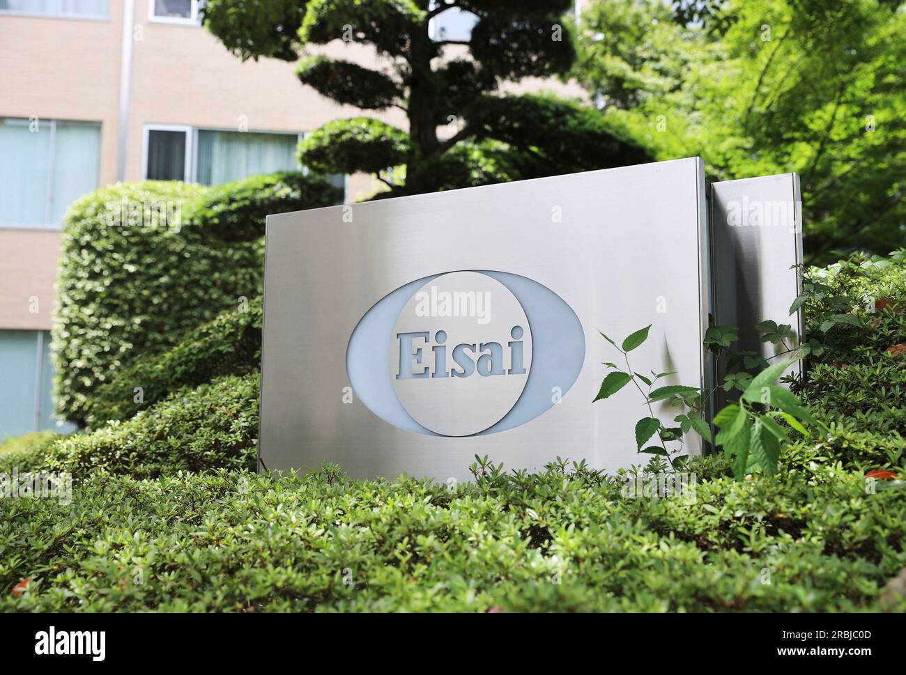 The logo of Japanese pharmaceutical company Eisai Co., Ltd. is seen at its headquarters in ...