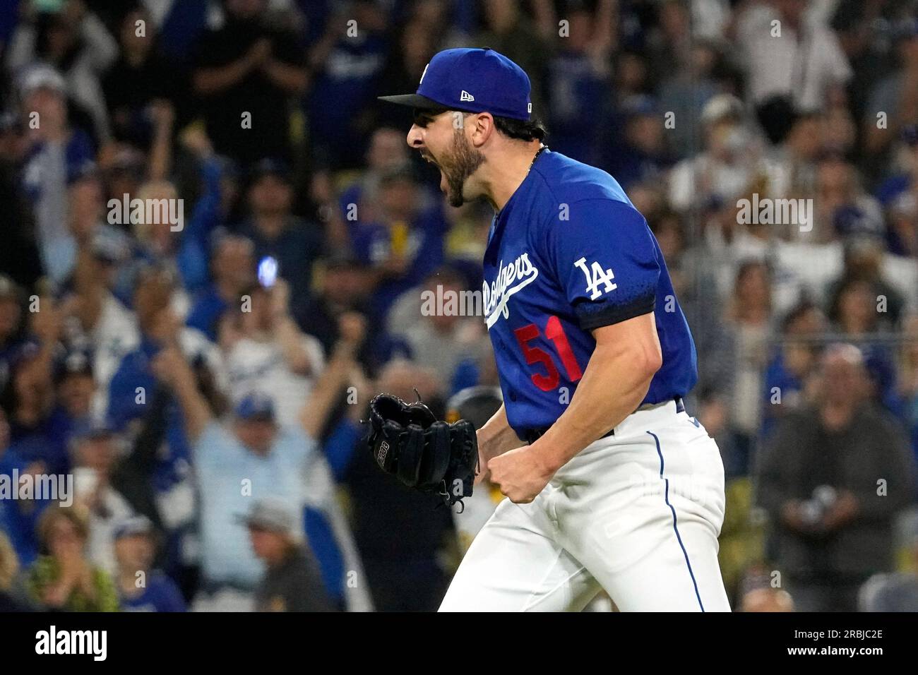 Los Angeles Dodgers relief pitcher Alex Vesia celebrates after striking ...