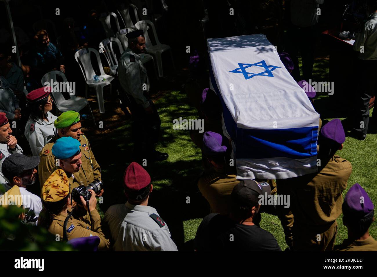 Israeli soldiers carry the flag-covered coffin of Staff Sgt. Shilo ...