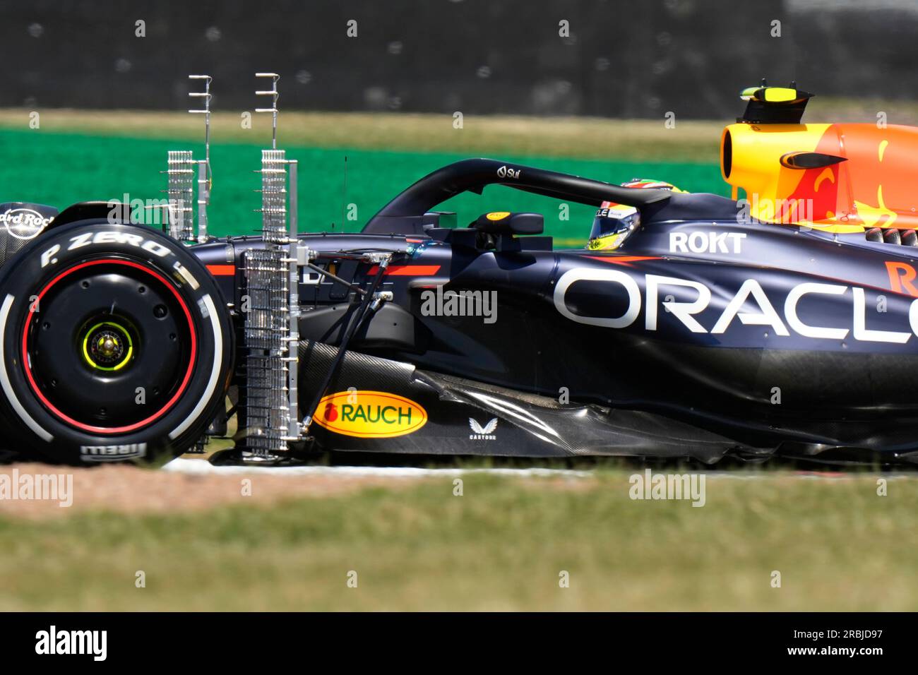 Red Bull driver Sergio Perez of Mexico steers his car during the first free practice at the ...