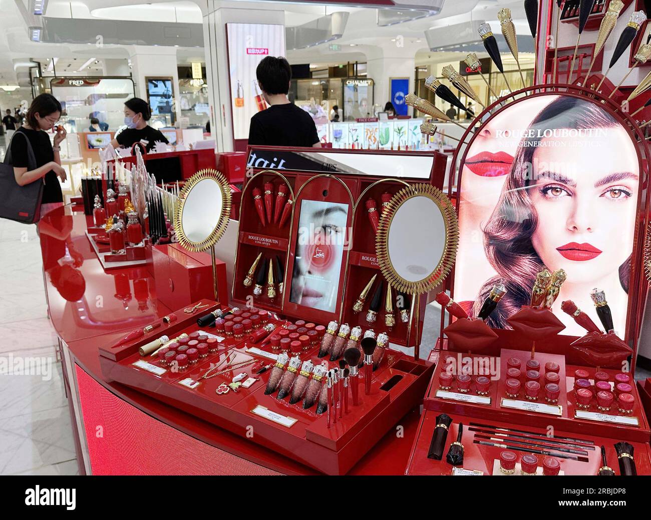 A photo shows the cosmetics section of a commercial facility in Beijing ...