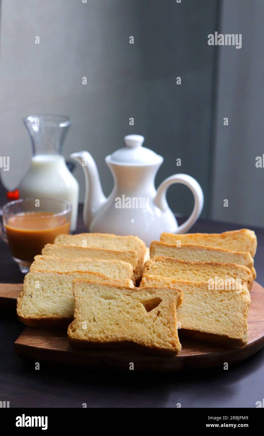 Tea Time Snack. Healthy Wheat rusk served with Indian hot masala tea ...