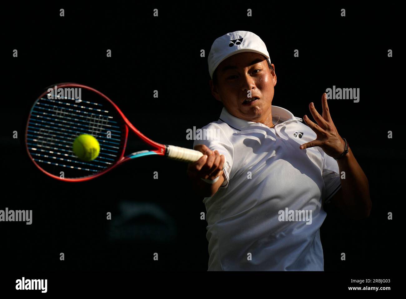 China's Bai Zhuoxuan plays a return to Tunisia's Ons Jabeur during the ...