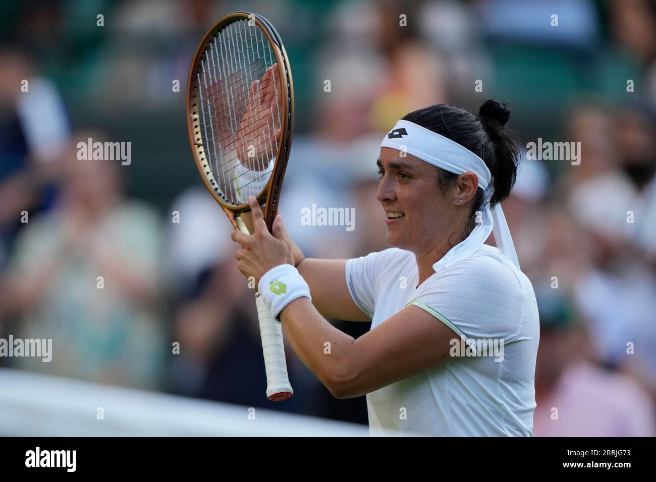 Tunisia's Ons Jabeur celebrates defeating China's Bai Zhuoxuan during ...