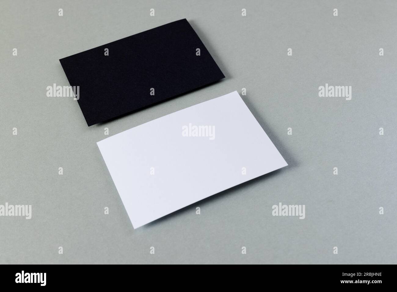 White and black business cards with copy space on grey background Stock ...