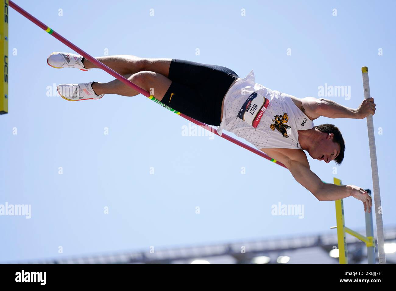 Austin West competes in the pole vault for the men's decathlon ...