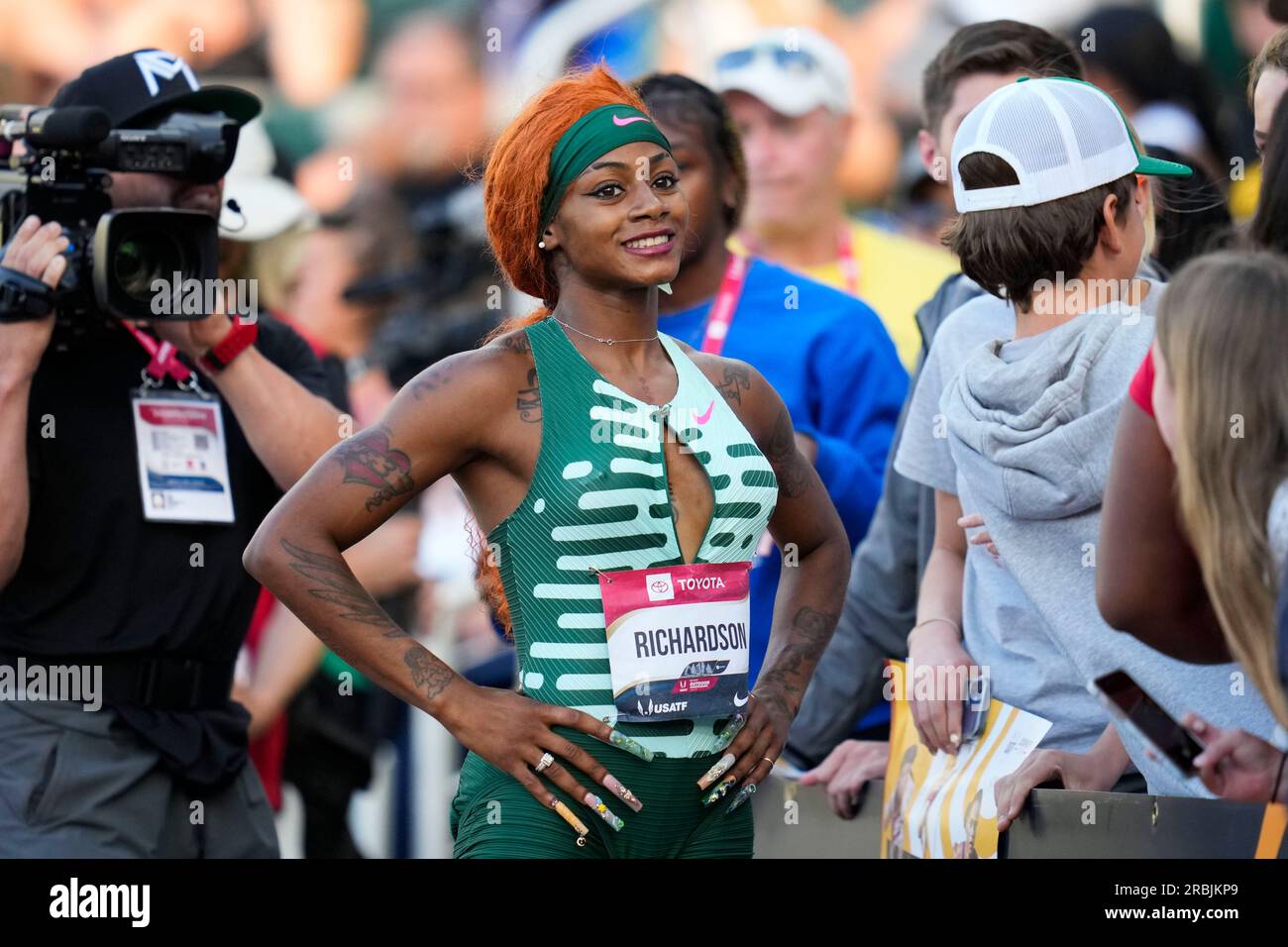 Sha'Carri Richardson smiles after winning her heat in the women's 100 ...