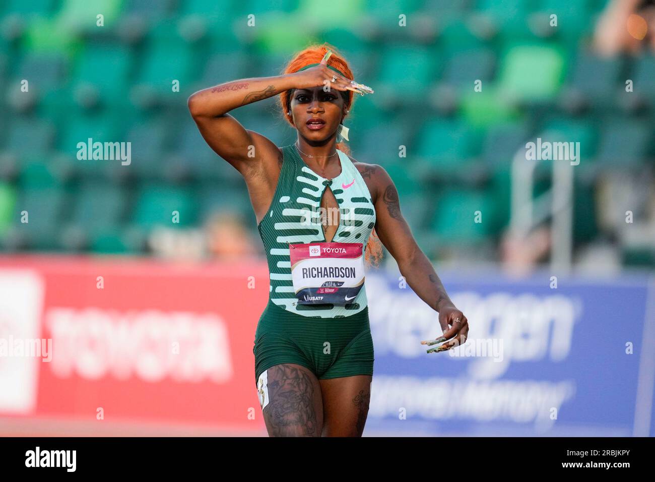 Sha'Carri Richardson walks on the track after winning her heat in the ...