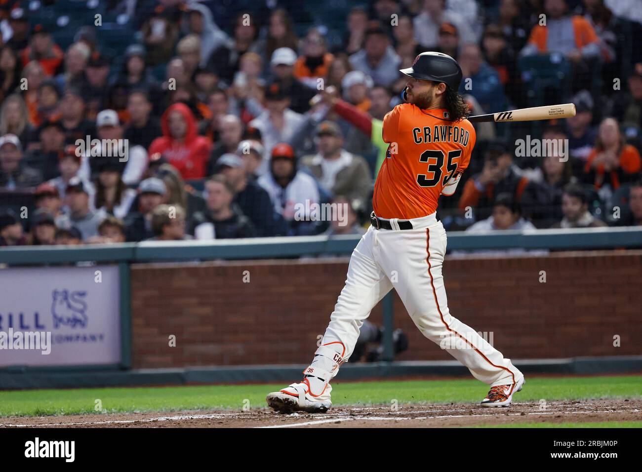 San Francisco Giants Brandon Crawford follows through on a two-run home ...
