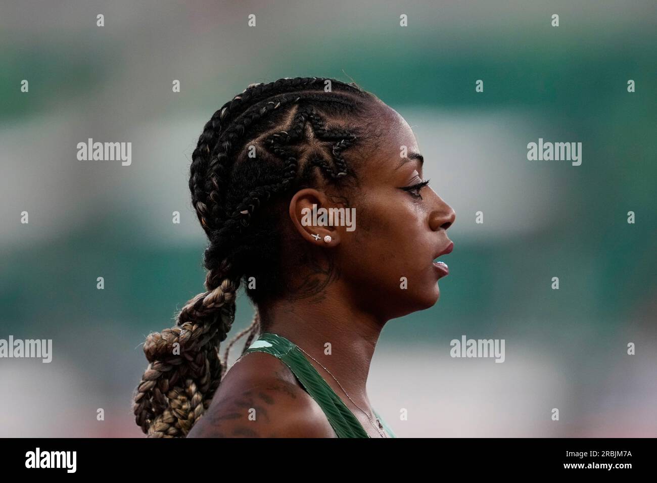 Sha'Carri Richardson walks on the track after winning the women's 100 ...