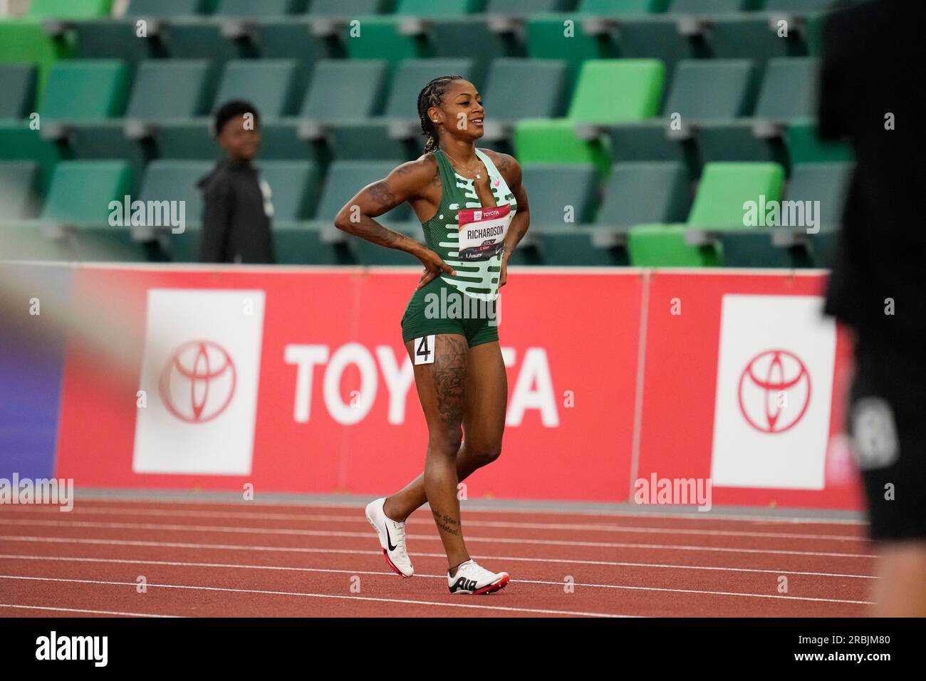 Sha'Carri Richardson walks on the track after winning the women's 100 ...