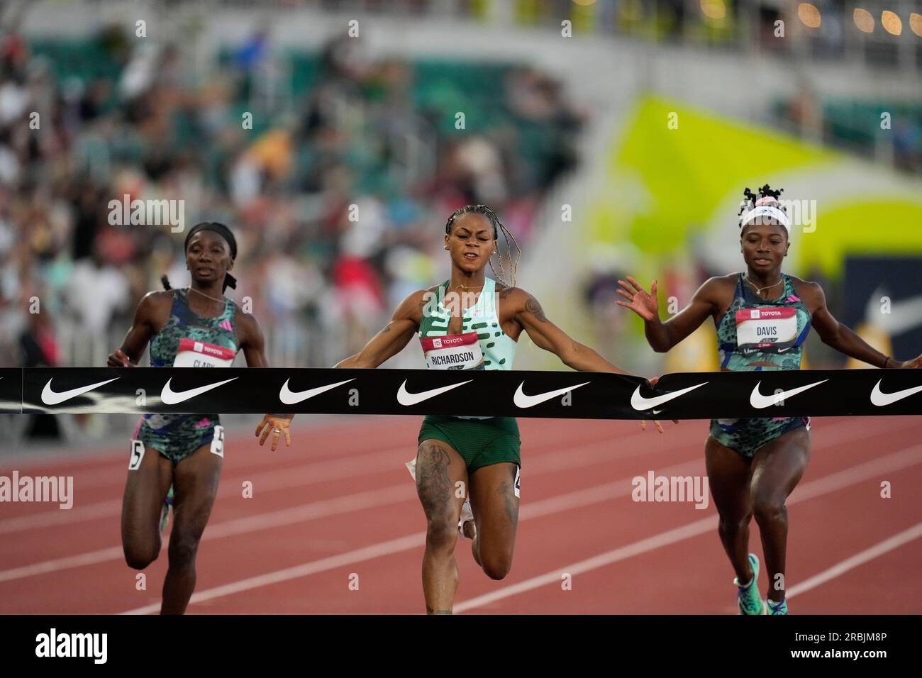 Sha'Carri Richardson crosses the line ahead of Brittany Brown, who took ...