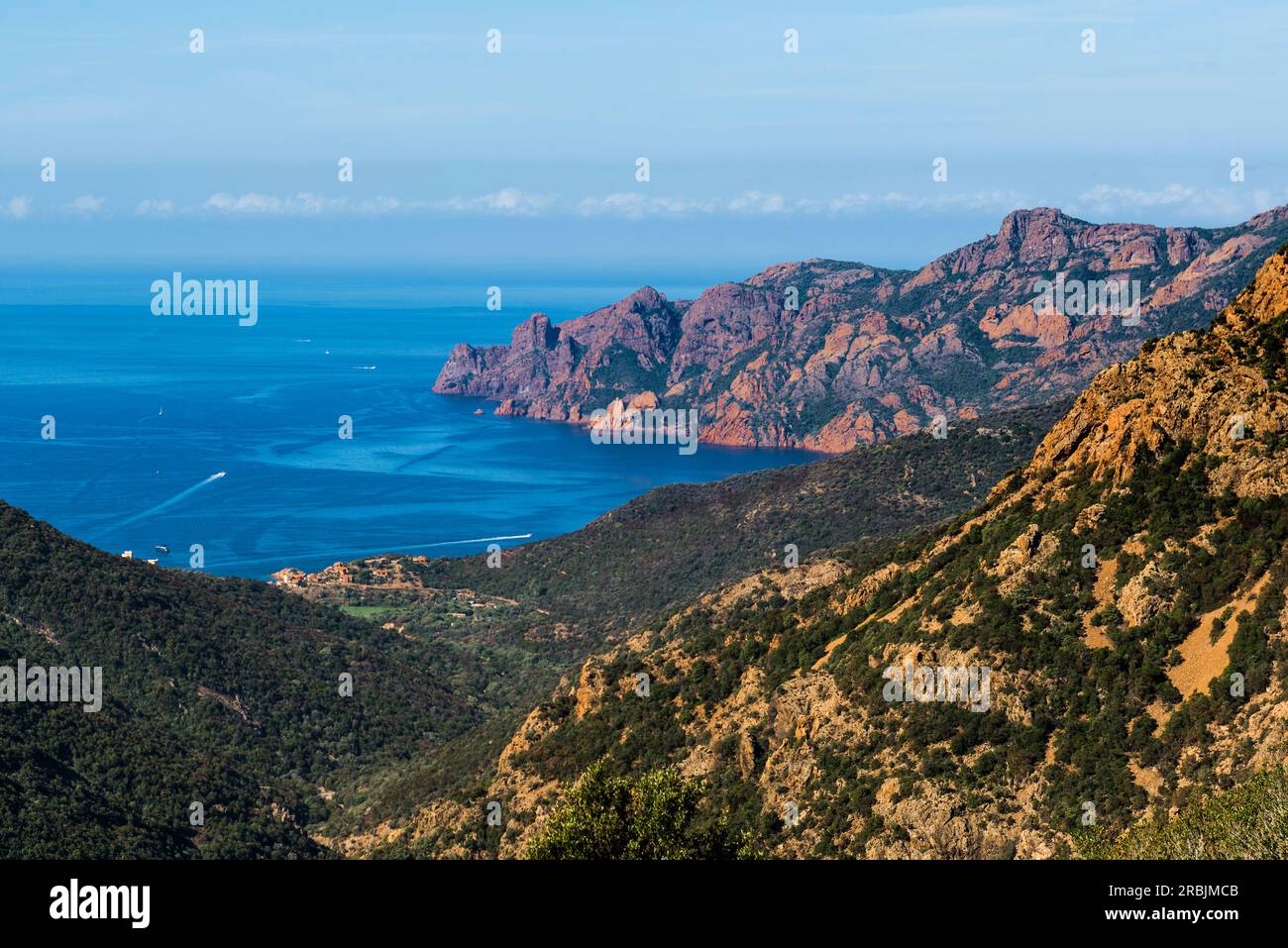 Rocky coast and red cliffs, Bay of Girolata, Girolata, La Scandola ...