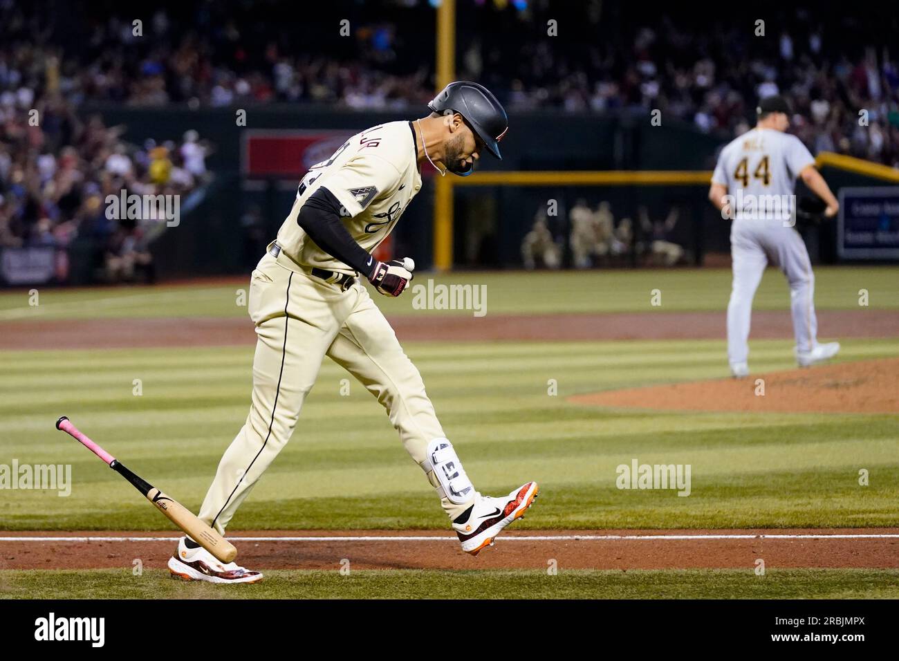 Arizona Diamondbacks' Lourdes Gurriel Jr., left, celebrates his three ...