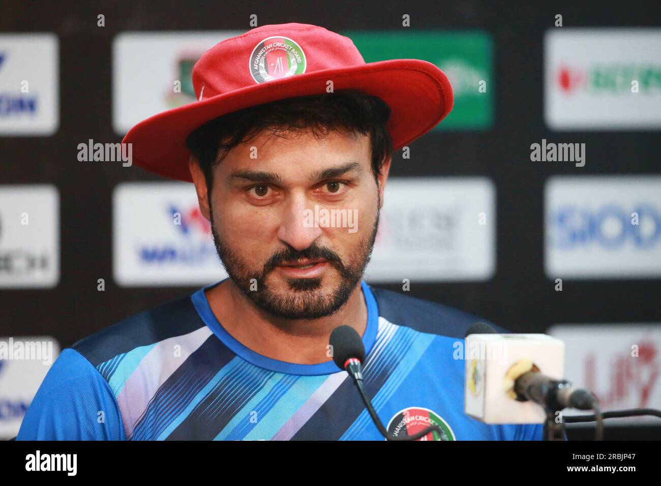 Afghanistan bowling coach Hamid Hasan attends a pre-match press ...
