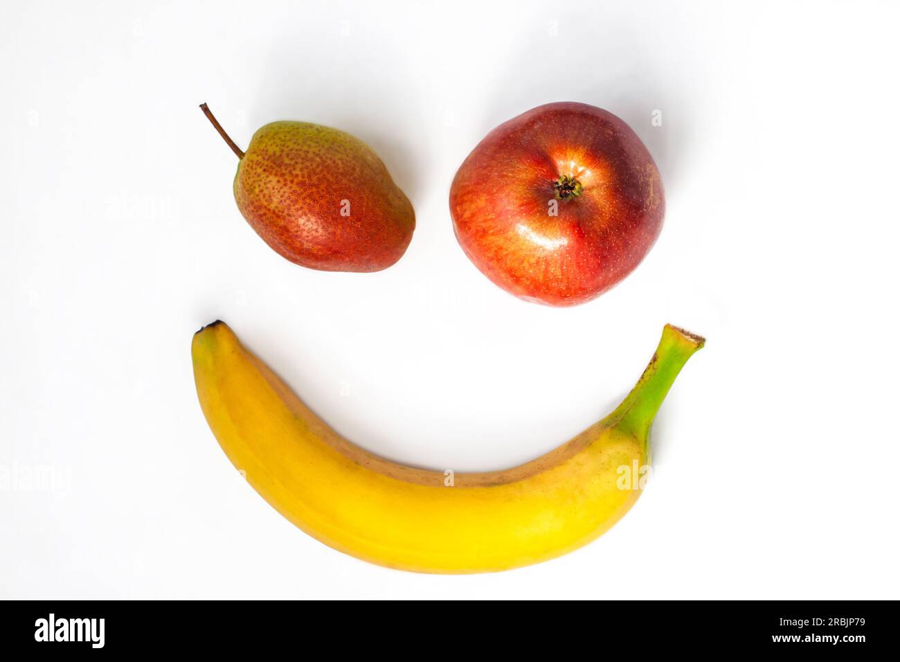 Fresh banana, apple, pear fruits like smiley face. Creative healthy ...