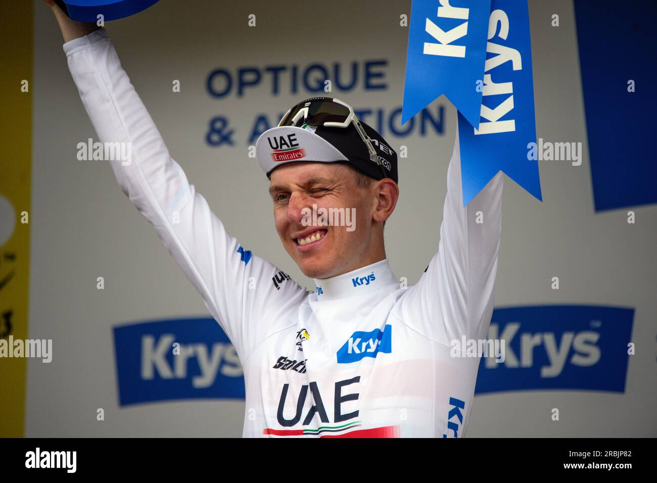 Slovenia's Tadej Pogacar, wearing the best young rider's white jersey ...