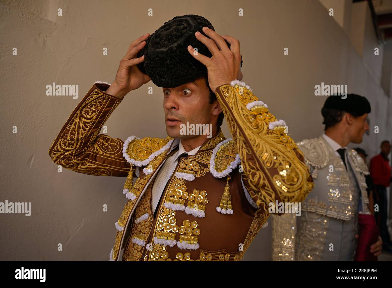 Bullfighter Juan del Alamo adjusts his montera before to entering in ...