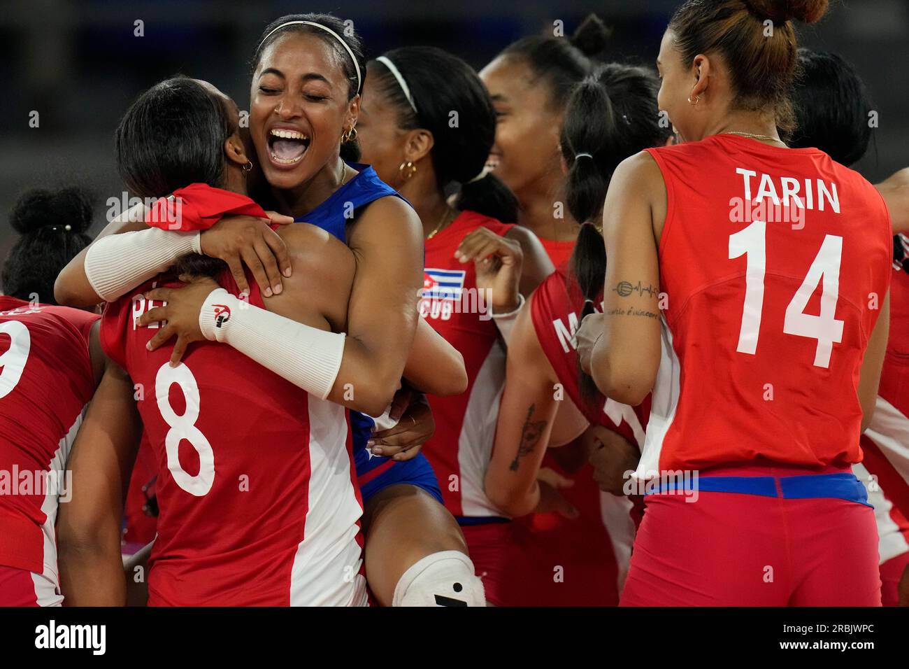Cuba teammates celebrate their victory over Colombia, at the end of the ...