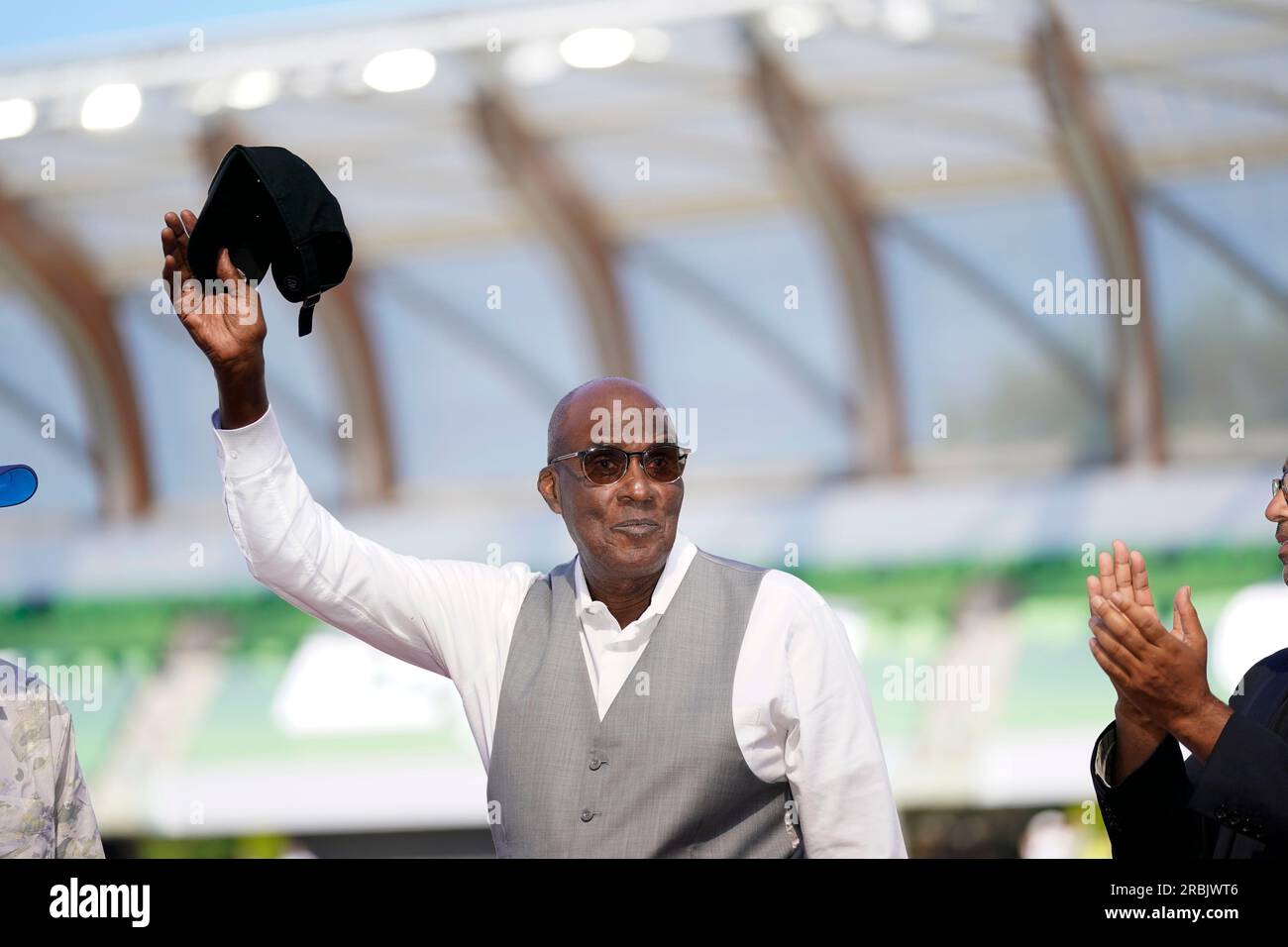 Bobby Kersee holds up his hat as he is honored as the 2023 USATF Legend ...