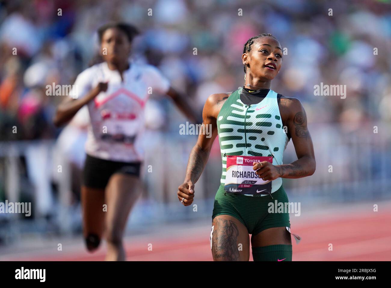 Sha'Carri Richardson wins her heat in the first round of the women's ...