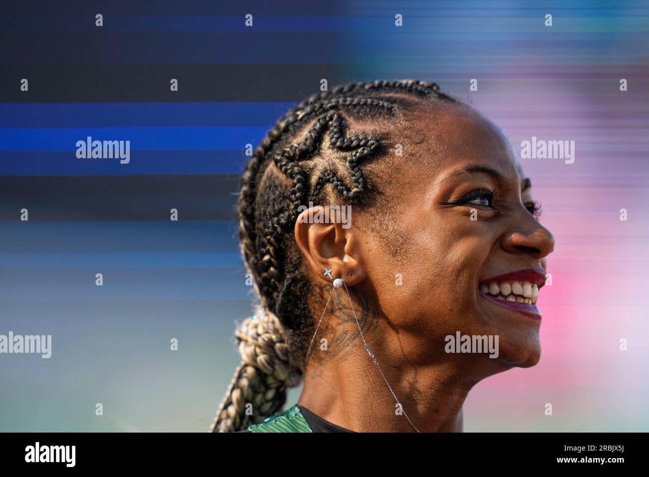 Sha'Carri Richardson reacts as she wins her heat in the first round of ...