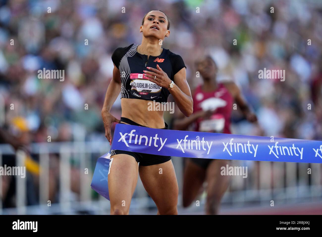 Sydney McLaughlin-Levrone crosses the finish line to win the women's ...