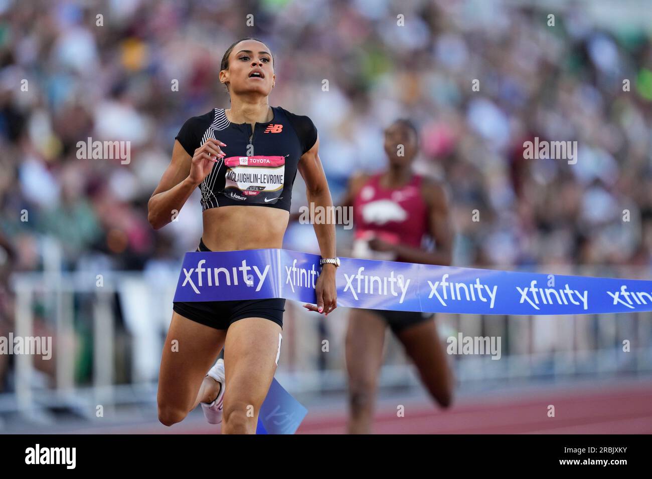 Sydney McLaughlin-Levrone crosses the finish line to win the women's ...