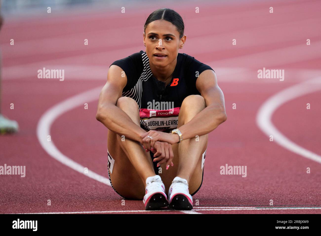 Sydney McLaughlin-Levrone catches her breath after winning the women's ...