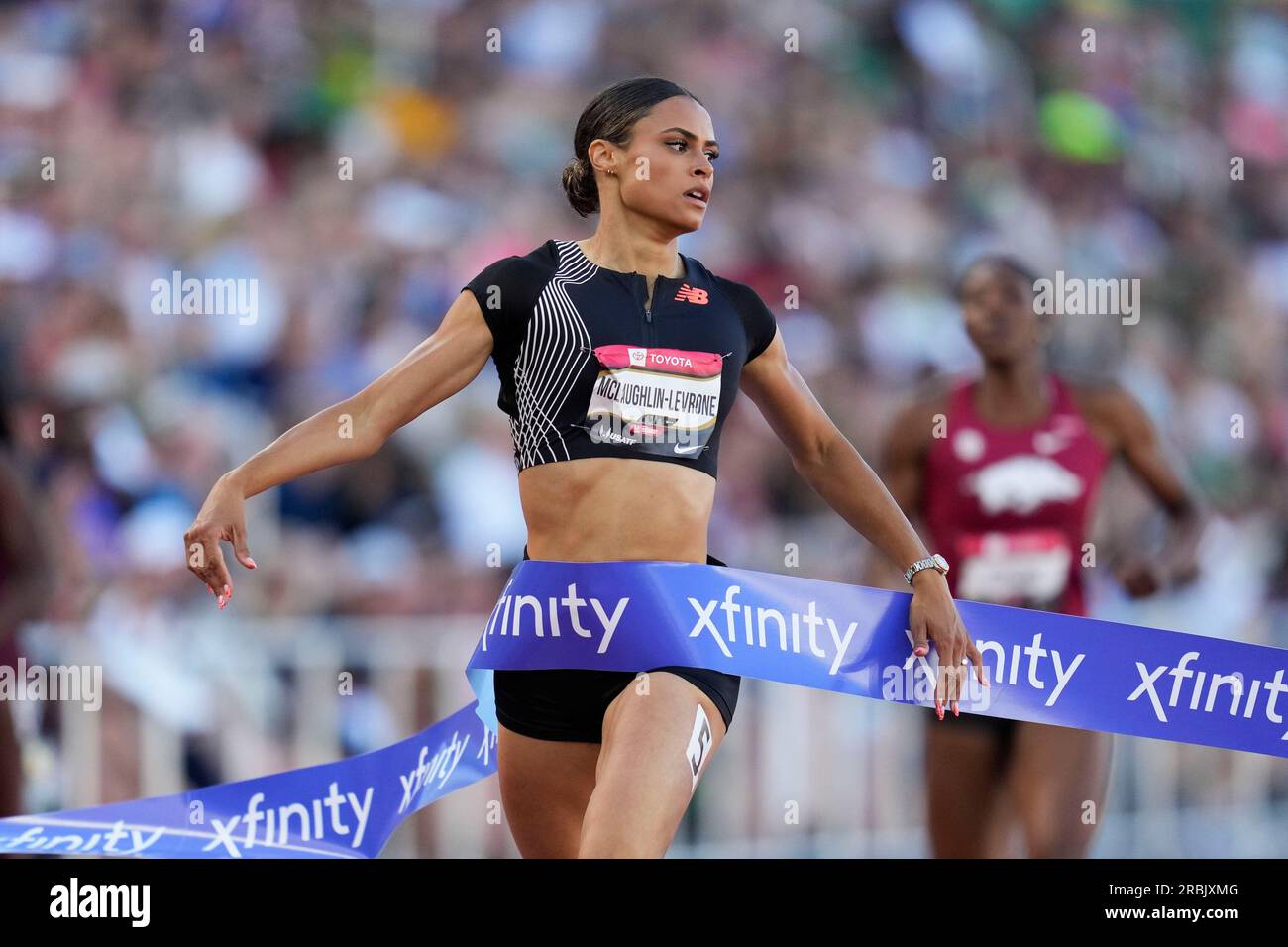 Sydney McLaughlin-Levrone crosses the finish line to win the women's ...