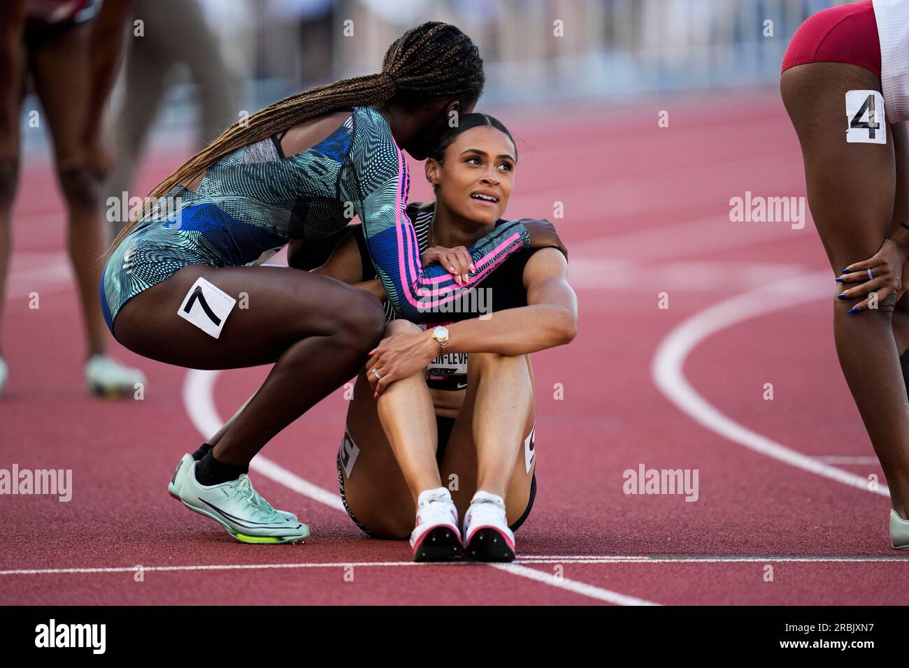 Sydney McLaughlin-Levrone is congratulated by third place finisher ...