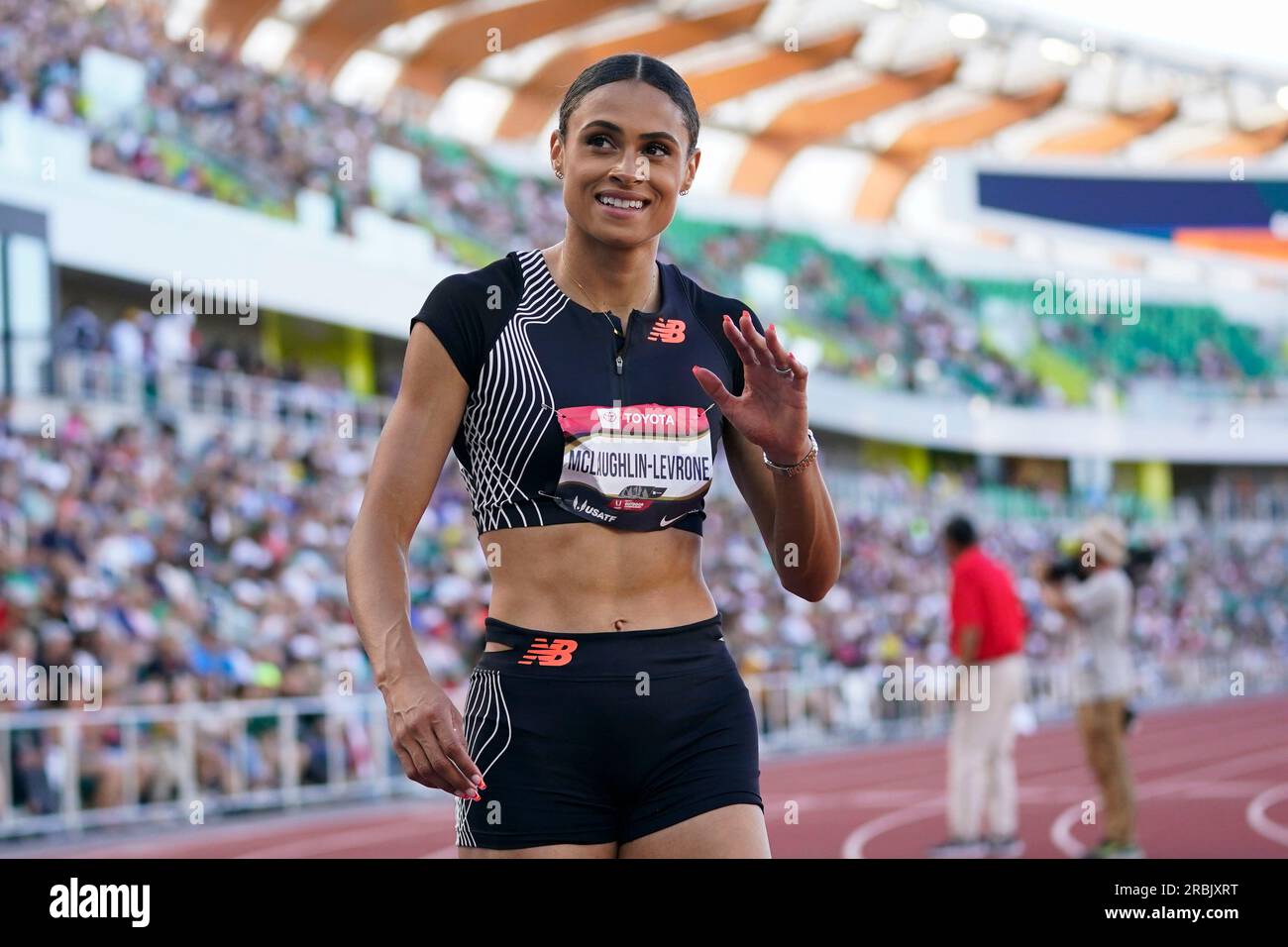 Sydney McLaughlin-Levrone waves to the crowd after winning the women's ...