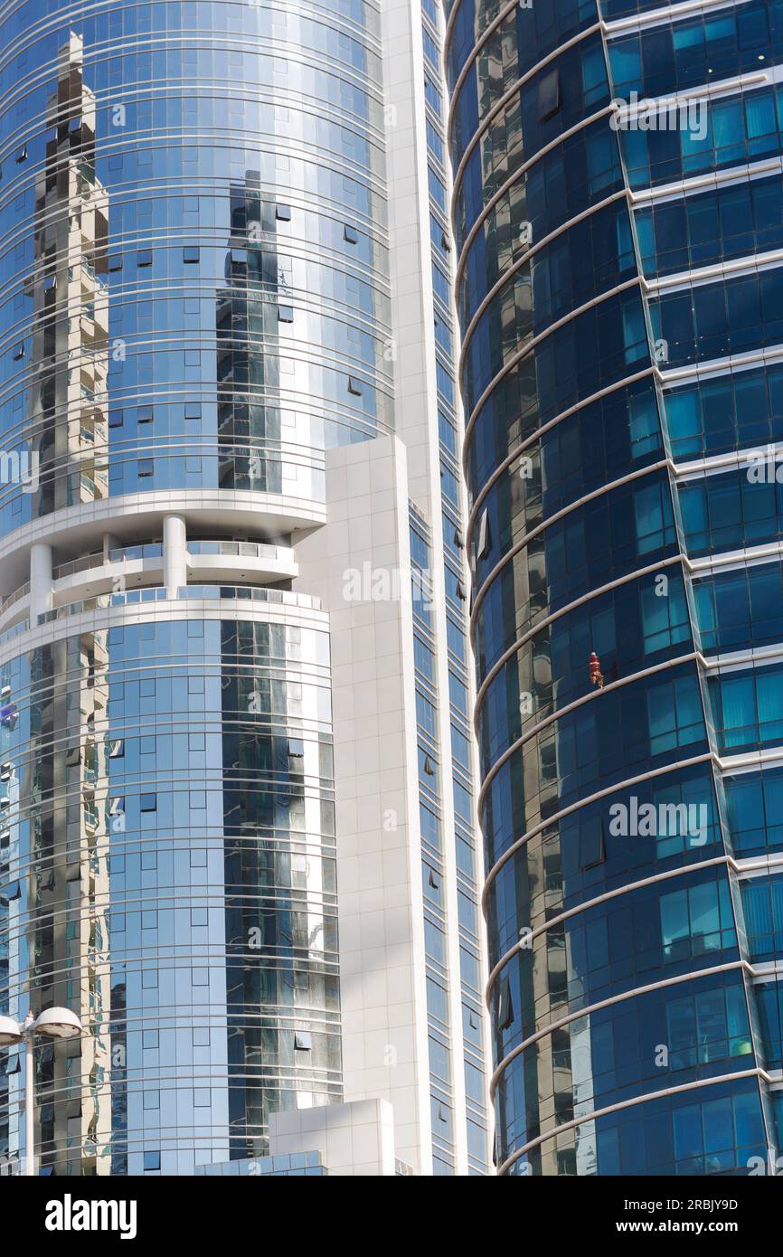 UAE, Dubai, reflections in office blocks, Jumeirah Lake Towers Stock ...