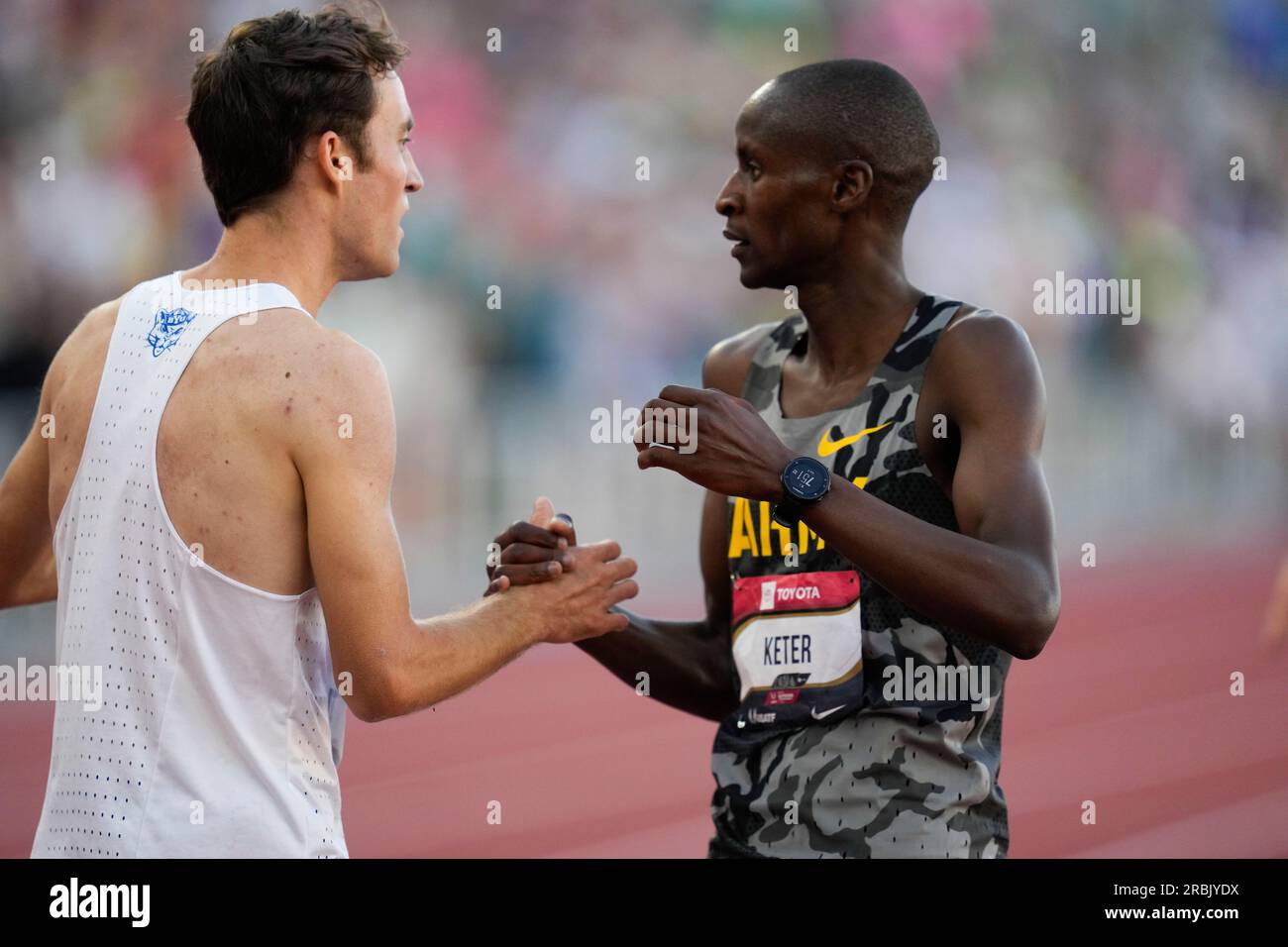 Second place finisher Benard Keter congratulates winner Kenneth Rooks ...