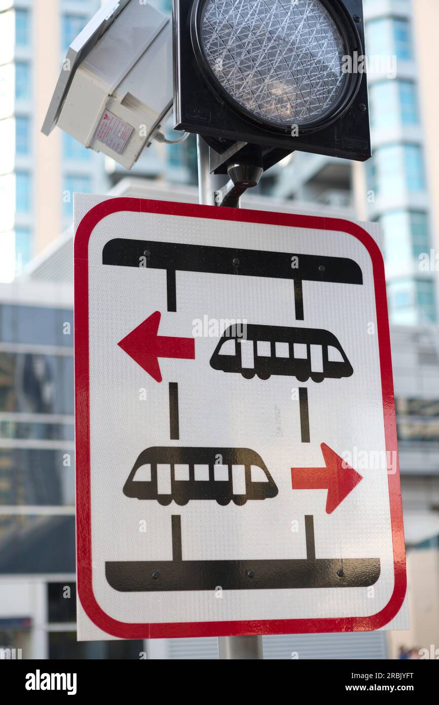 UAE, Dubai, train track crossing signpost at the Dubai Marina area for ...