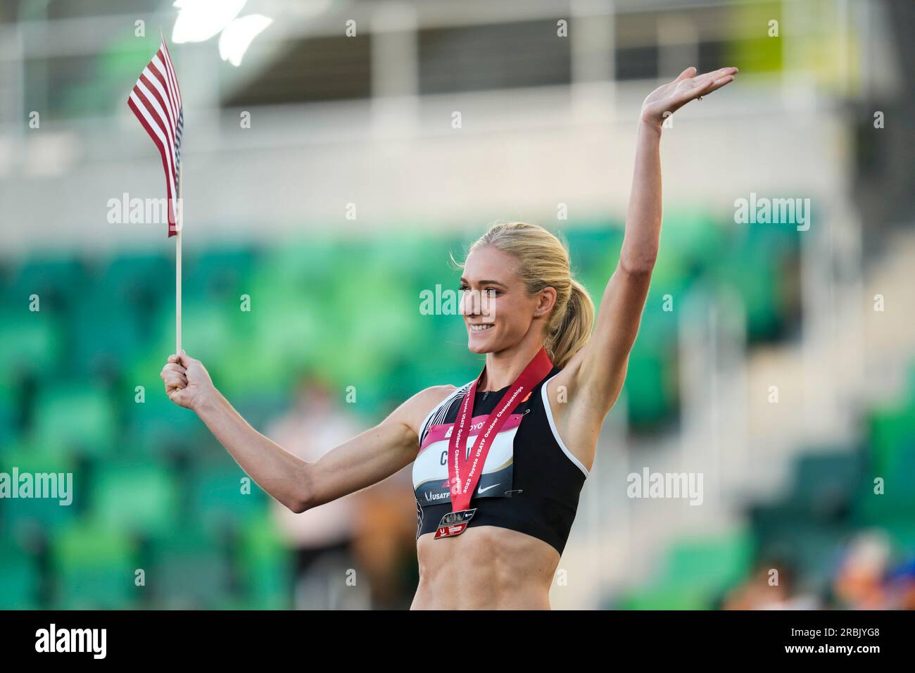 Emma Coburn celebrates her silver medal in the women's 3000 meter ...