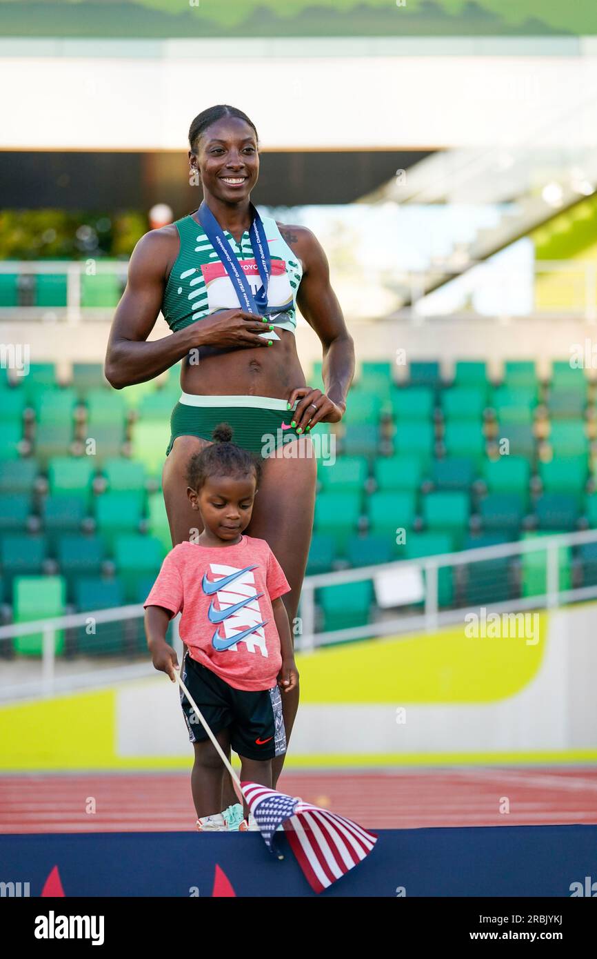 Nia Ali, silver medalist in the women's 3000 meter steeplechase, waves ...