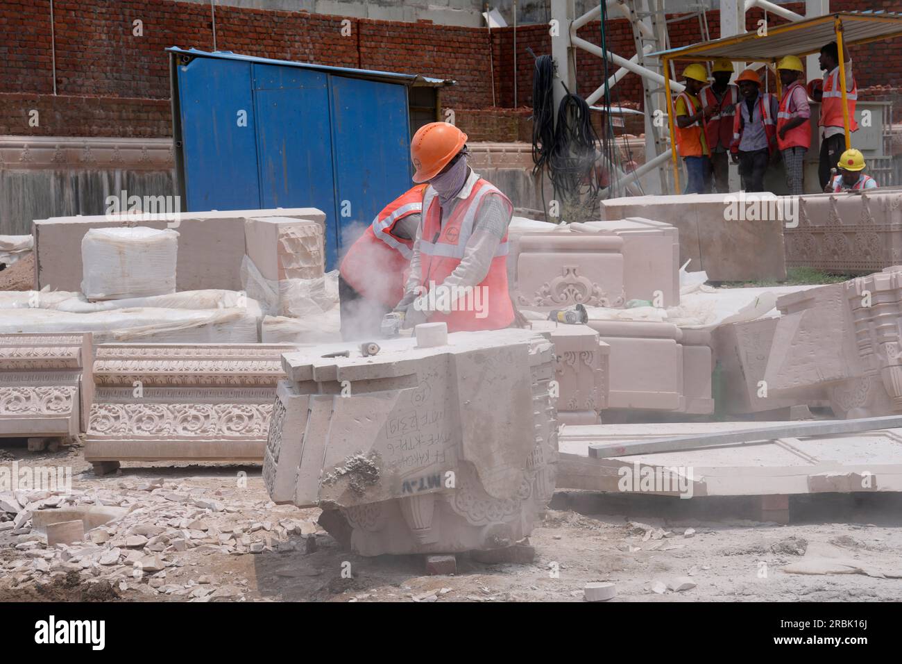 Workers are engaged in the construction of a temple of Hindu god Ram ...